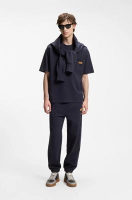 Hugo Cotton-terry Sweatpants With Logo Badge - Dark Blue