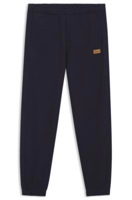 Hugo Cotton-terry Sweatpants With Logo Badge - Dark Blue