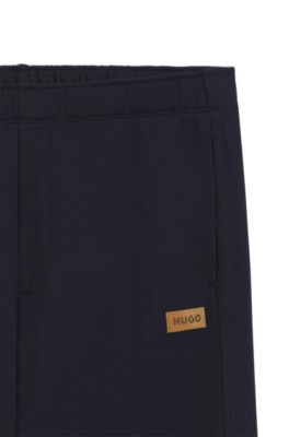 Hugo Cotton-terry Sweatpants With Logo Badge - Dark Blue