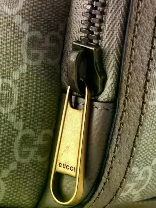 Gucci Interlocking G Patch Drawstring Flap Backpack
