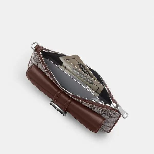 COACH OUTLET Coach Signature Jacquard Wristlet With Leather Accents - Silver/oak/maple