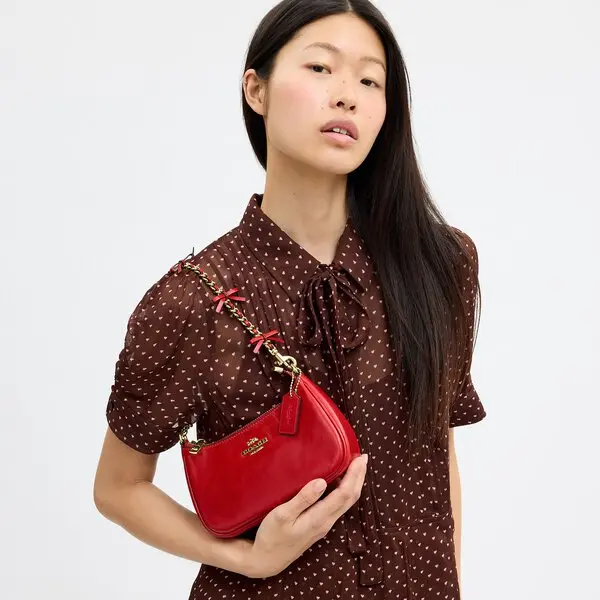 COACH OUTLET Teri Mini Crossbody Bag With Bow Detail - Gold/bright Cherry