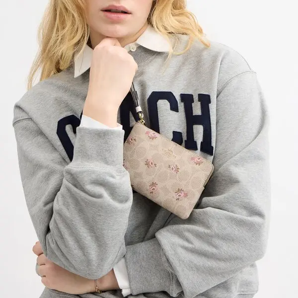 COACH OUTLET Coach Corner Zip Wristlet In Signature Canvas With Floral Print - Gold/sand Multi