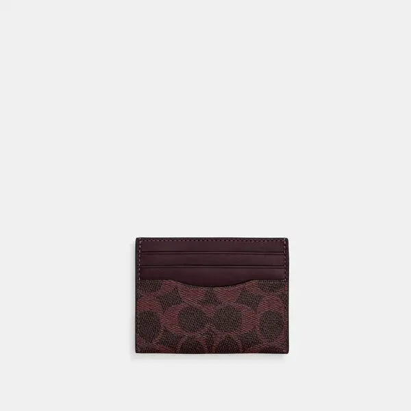 COACH OUTLET Slim Id Card Case In Signature Canvas - Black Currant