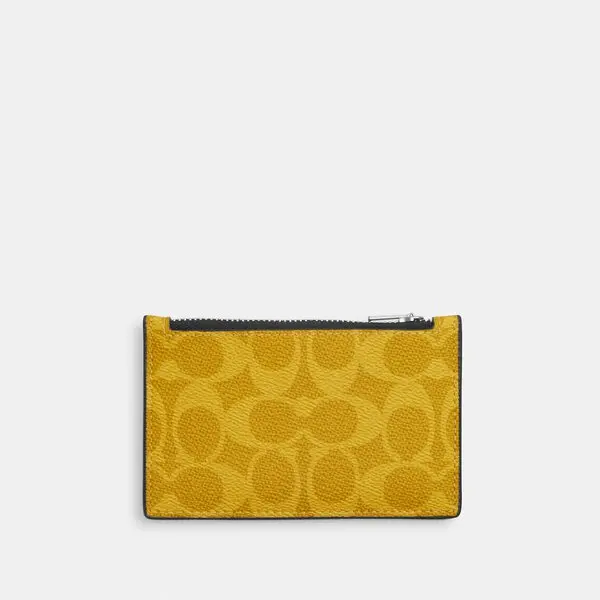 COACH OUTLET Zip Card Case In Signature Canvas - Silver/canary