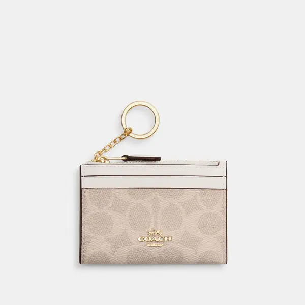 COACH OUTLET Mini Skinny Id Case In Signature Canvas - Gold/sand/chalk