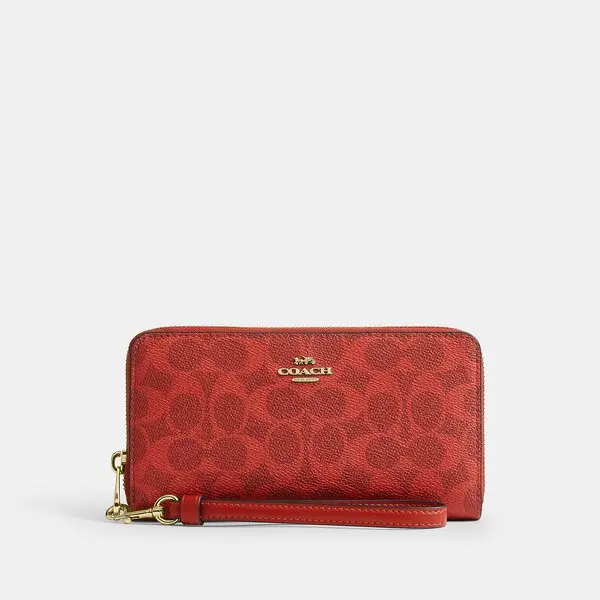 COACH OUTLET Long Zip Around Wallet In Signature Canvas - Gold/crimson