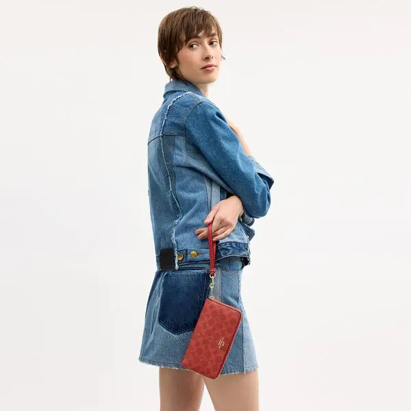 COACH OUTLET Long Zip Around Wallet In Signature Canvas - Gold/crimson