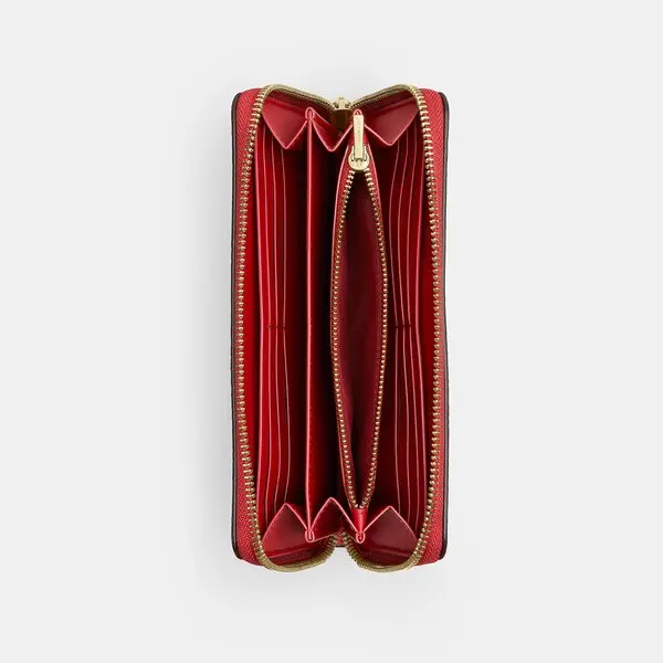 COACH OUTLET Long Zip Around Wallet In Signature Canvas - Gold/crimson