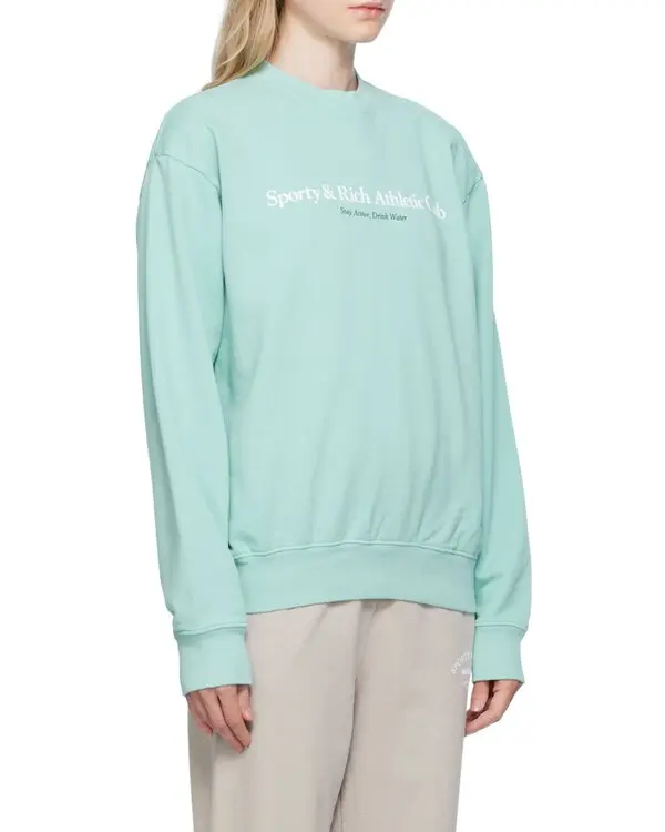 SPORTY  RICH Sporty & Rich Logo Round Neck Sweater
