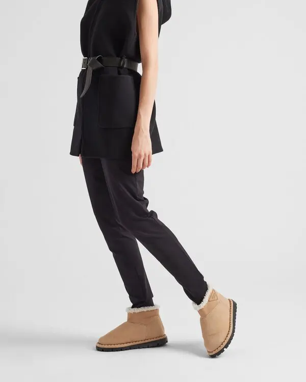 Prada Logo Triangle Round Toe Sheep Fur Boots
