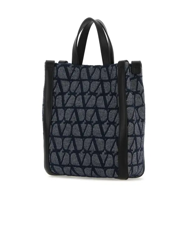 Valentino Garavani All-over Logo Patterned Top Handle Bag - Black