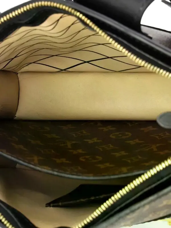 LOUIS VUITTON Reverse Monogram Canvas Clutch Bag
