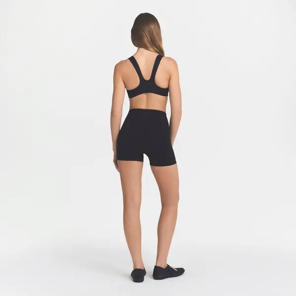 SKIMS Racer Back Bra | Black | | Nike Studio Stretch