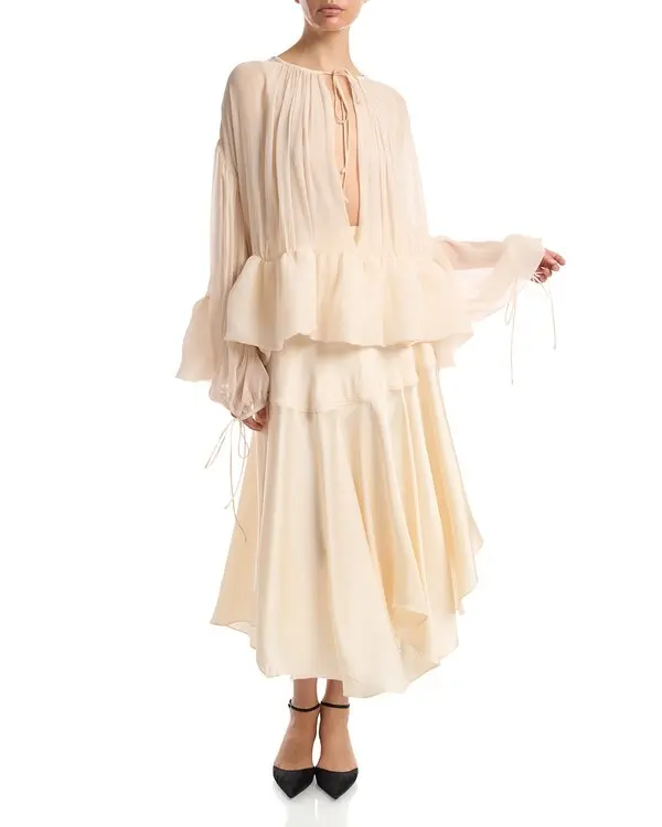 LIBEROWE Peplum Silk Blouse