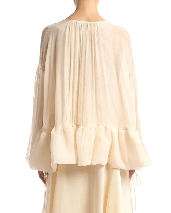 LIBEROWE Peplum Silk Blouse