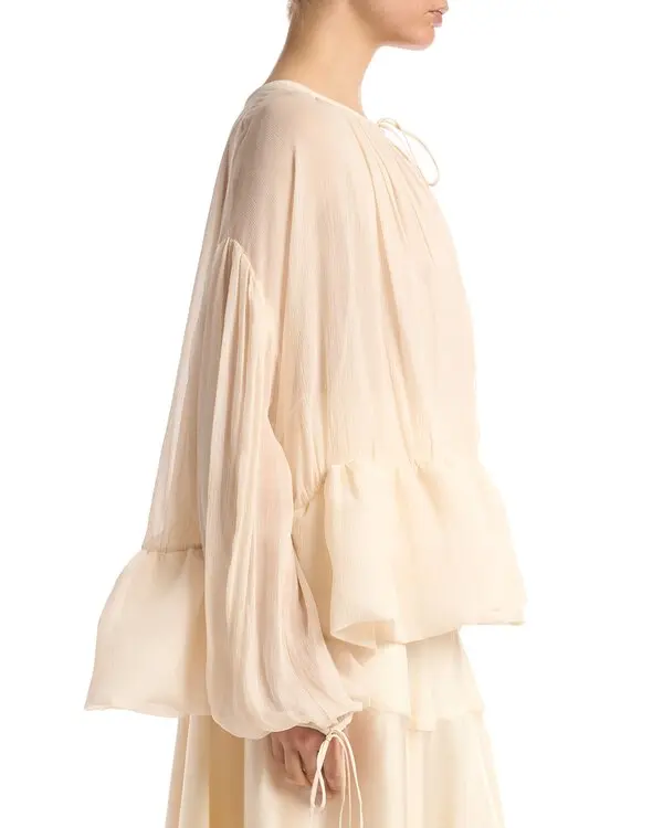 LIBEROWE Peplum Silk Blouse