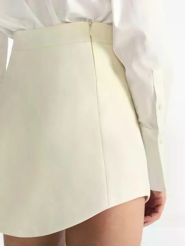THE ARKOW Rose Curved Hem Mini Skirt