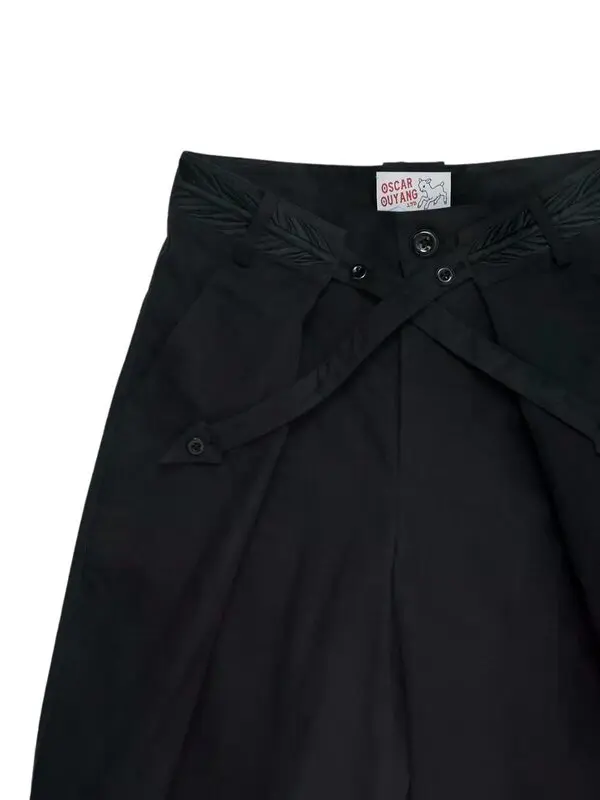 OSCAR OUYANG Cross Arrow Pleated Shorts