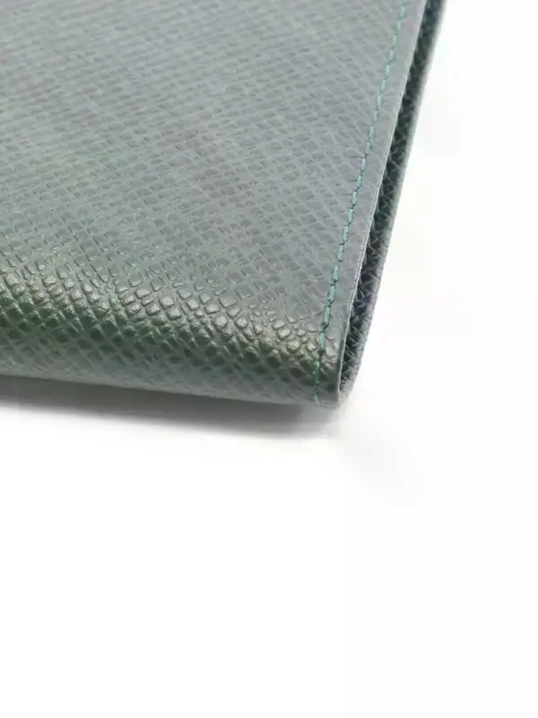 LOUIS VUITTON 2002 Taiga-leather Bi-fold Wallet