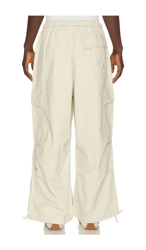 DRMERS CLUB Smiley Logo Parachute Pants
