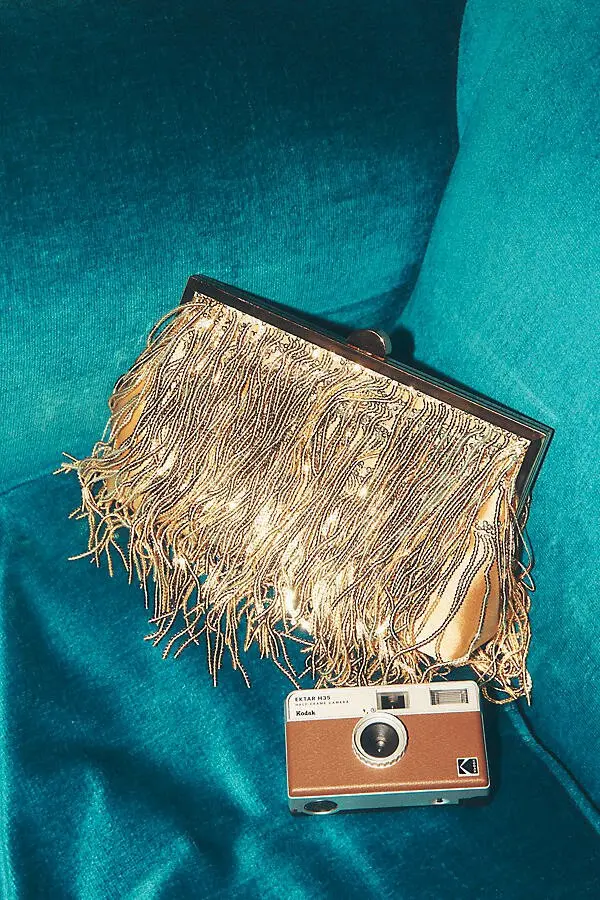 URBAN EXPRESSIONS Celesta Shimmer Handbag With Fringe Detail - Gold Metallic