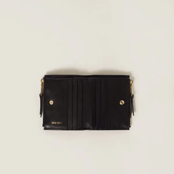 Miu Miu Logo Embossed Zipped Wallet