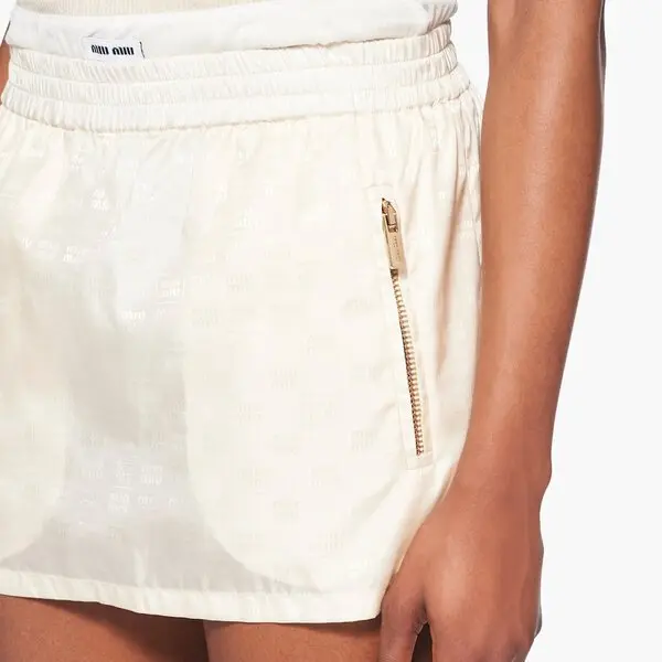 Miu Miu Emblem Mini Skirt