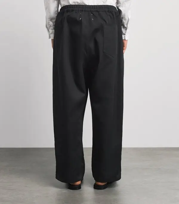 MAISON MARGIELA Drop-rise Wide-leg Trousers - Black