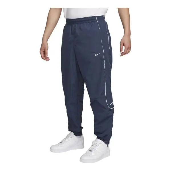 Nike Solo Swoosh Knit Zippered Pants - Thunder Blue