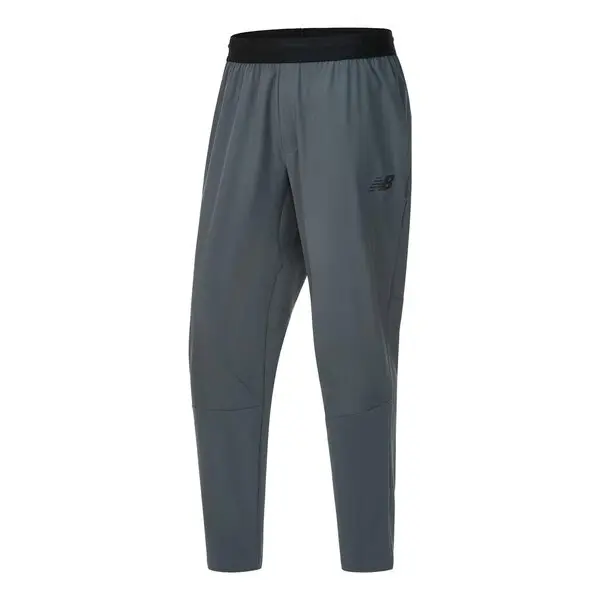 NEW BALANCE Rwtech Stretch Woven Pants Asia Sizing - Lead