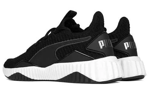 PUMA Defy Sneakers