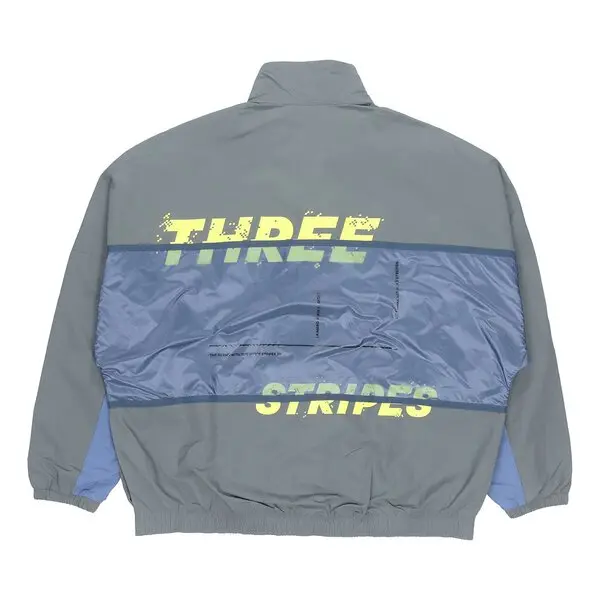Adidas Woven Jacket With Contrasting Panels And Graphic Print - Blue