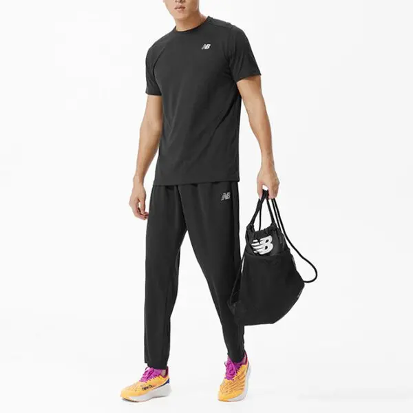 NEW BALANCE Tech Training Knit Track Pant Asia Sizing