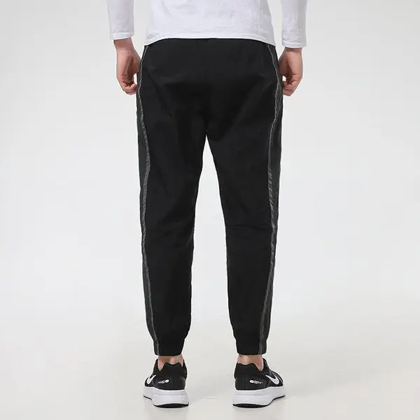 Nike Side Splicing Running Sports Woven Bundle Feet Pants