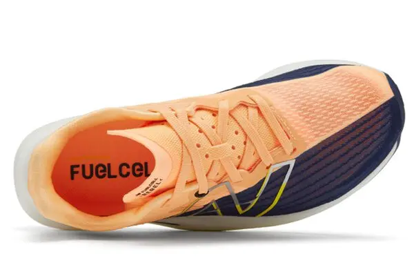 NEW BALANCE Fuelcell Rebel V2 Low Top Athletic Shoes - Blue/orange