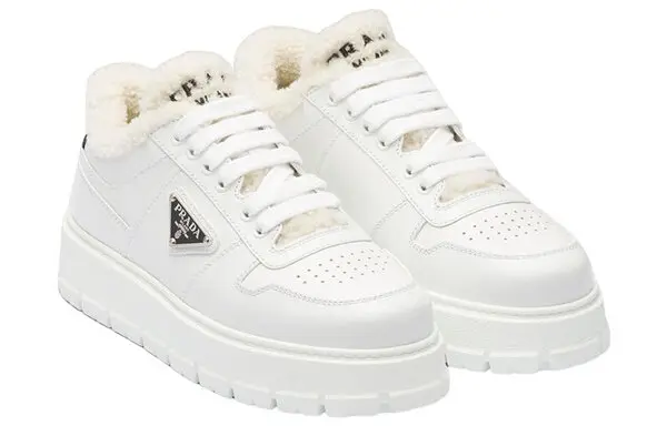 Prada Leather And Shearling Sneakers