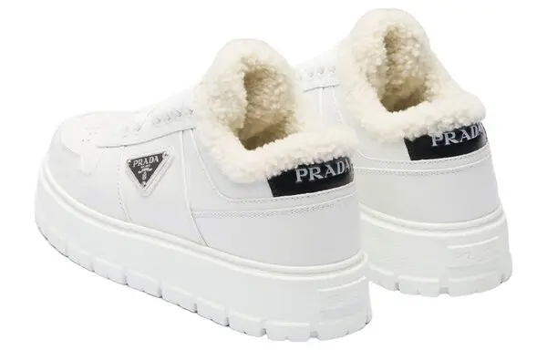 Prada Leather And Shearling Sneakers