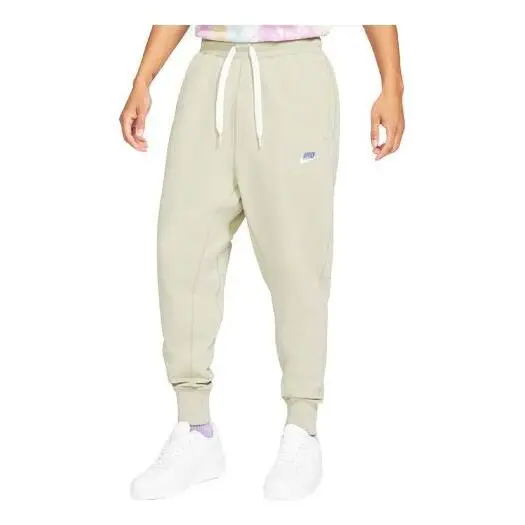 Nike Embroidered Logo Solid Color Bundle Feet Sports Pants Beige - Creamy