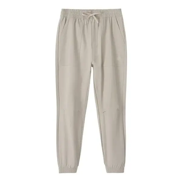 NEW BALANCE Essentials Stacked Sweatpants Asia Sizing - Beige