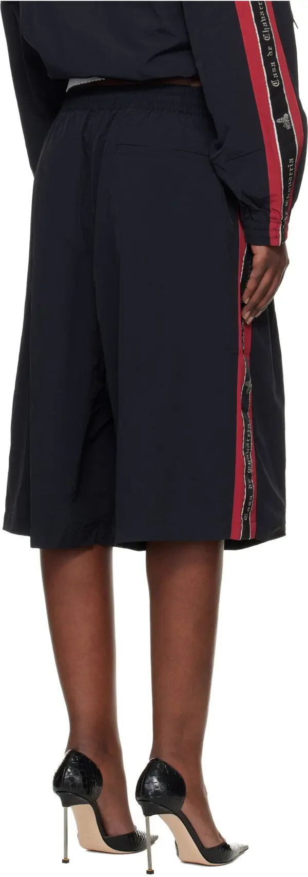 WILLY CHAVARRIA Logo Tape Pleated Shorts