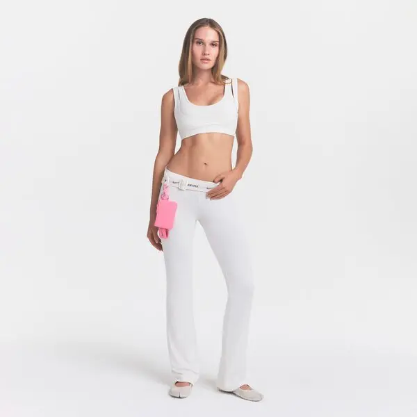 SKIMS Dri Fit™ Low Rise Mini Flare Pants | White | | Nike Airy - Ivory