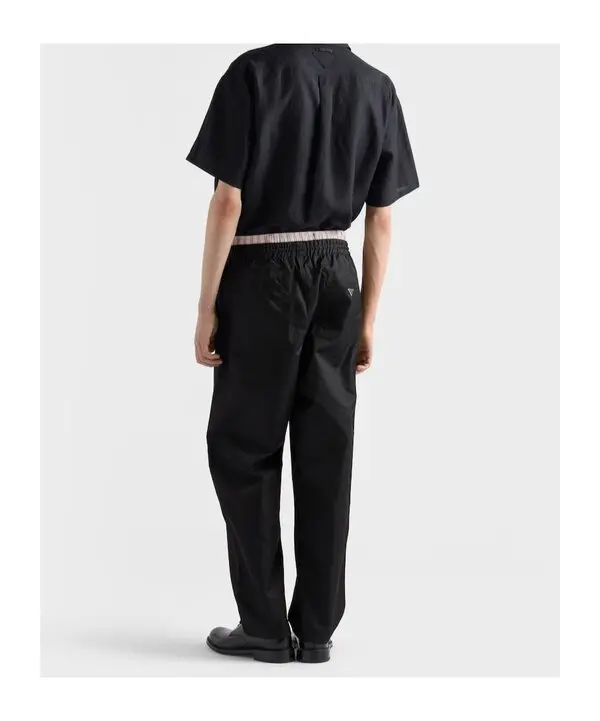 Prada Elasticated Waistband Trousers With Zippered Placket