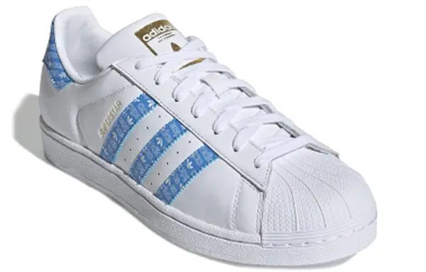 Adidas Superstar Low Top Sneakers With Blue Logo Print