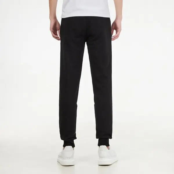 PUMA Classics Graphics Brand Love Placement Pants Tr