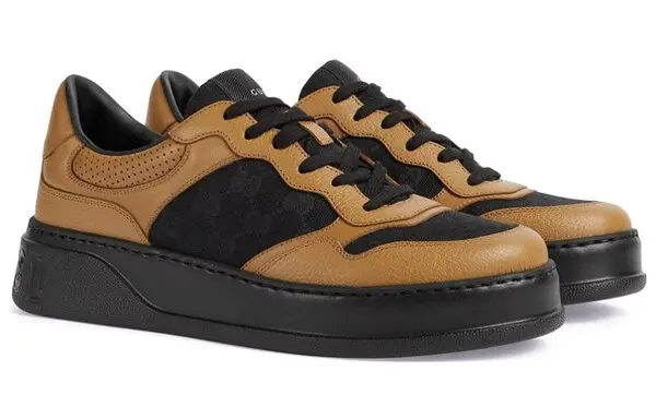 Gucci Gg Embossed Lace Up Sneakers