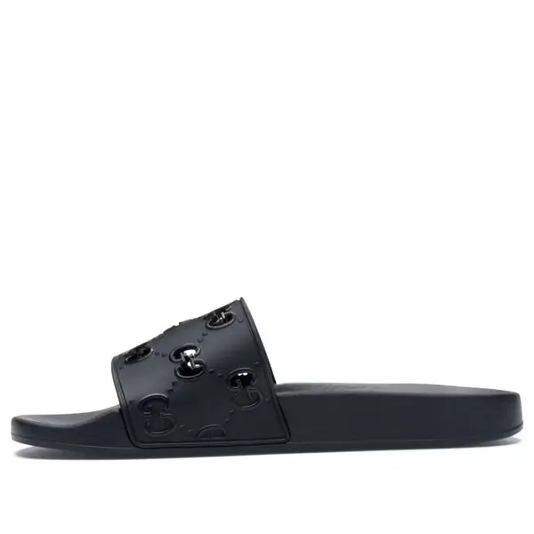 Gucci Rubber Slide Sandals With Embossed Gg Detail