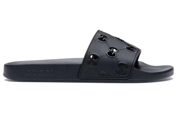Gucci Rubber Slide Sandals With Embossed Gg Detail