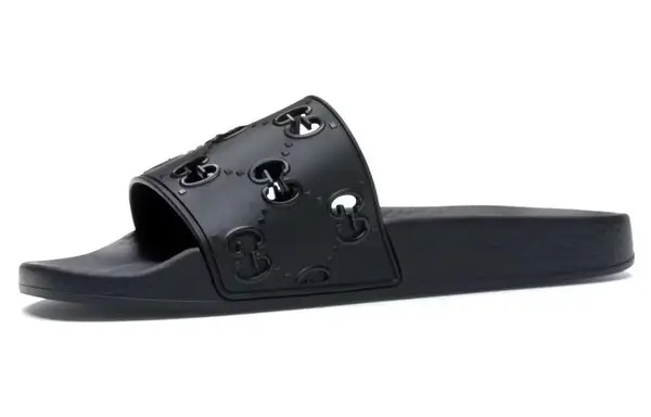 Gucci Rubber Slide Sandals With Embossed Gg Detail