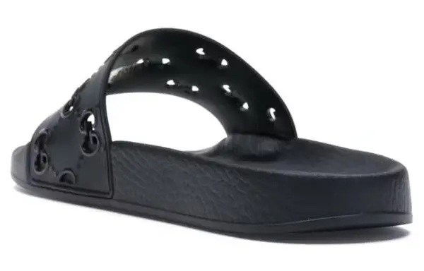 Gucci Rubber Slide Sandals With Embossed Gg Detail